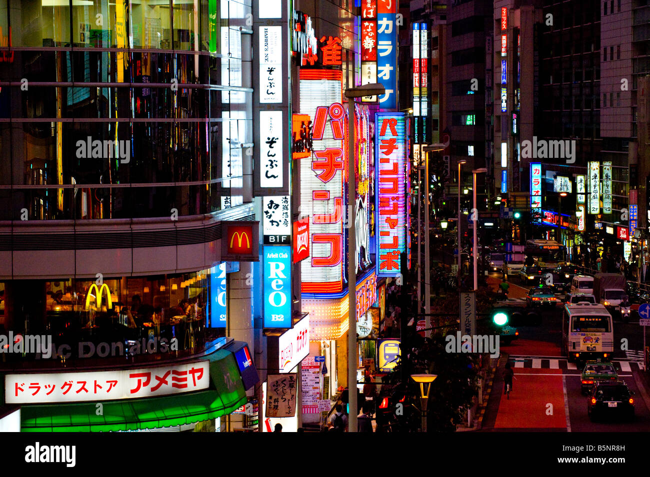 Neon signs in the streets of Shinjuku at night, Tokyo, Japan Stock ...