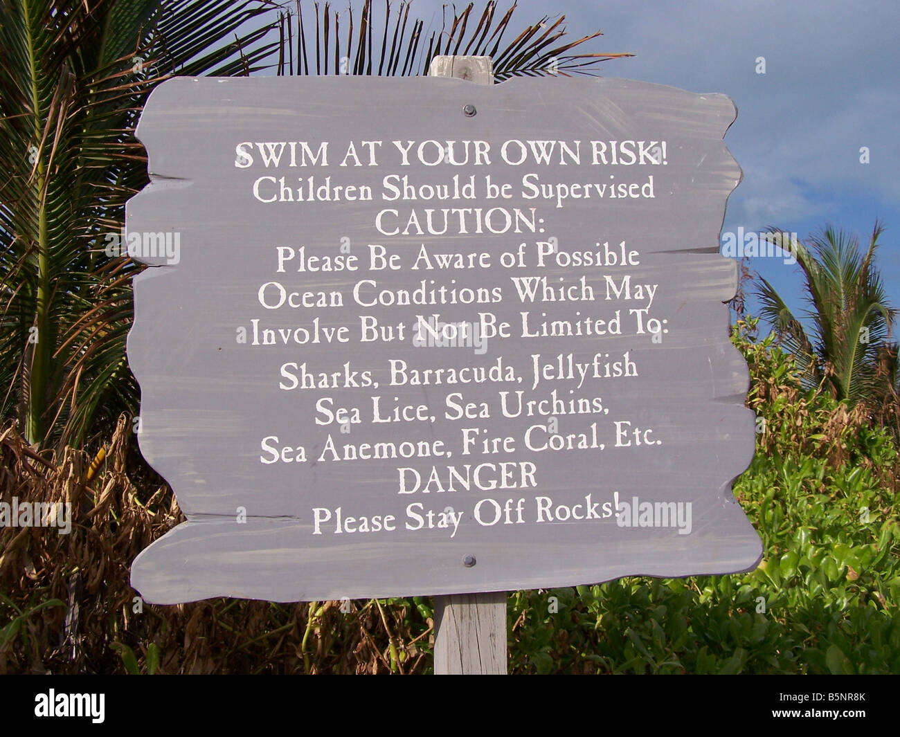 "Swim at your own risk" sign at the beach at an island in the Caribbean ...