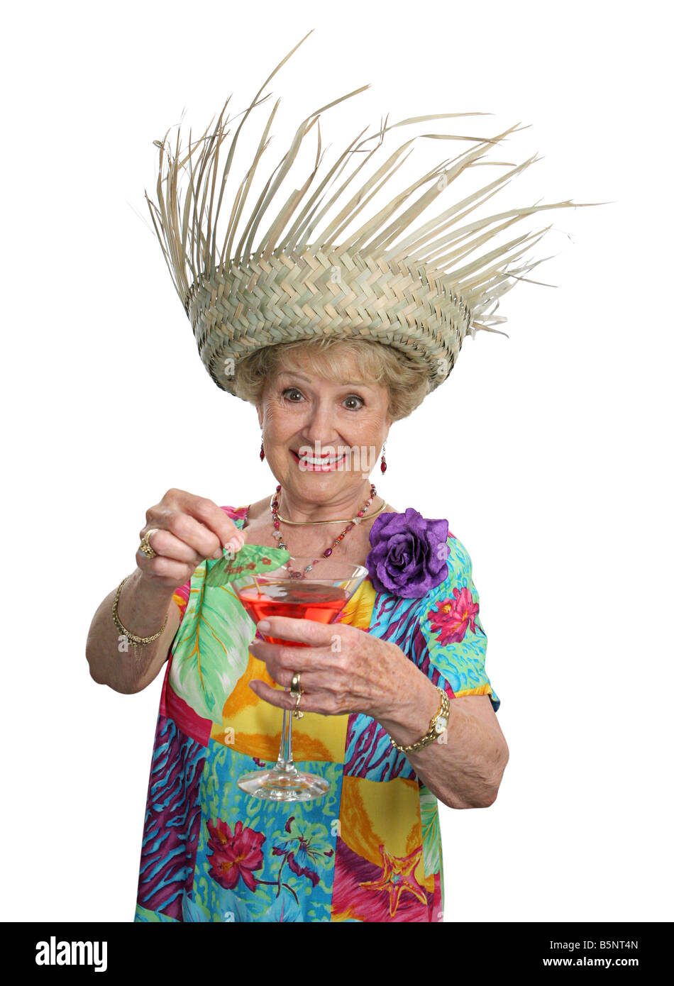 A beautiful senior woman inviting you to join her for a cocktail Stock ...