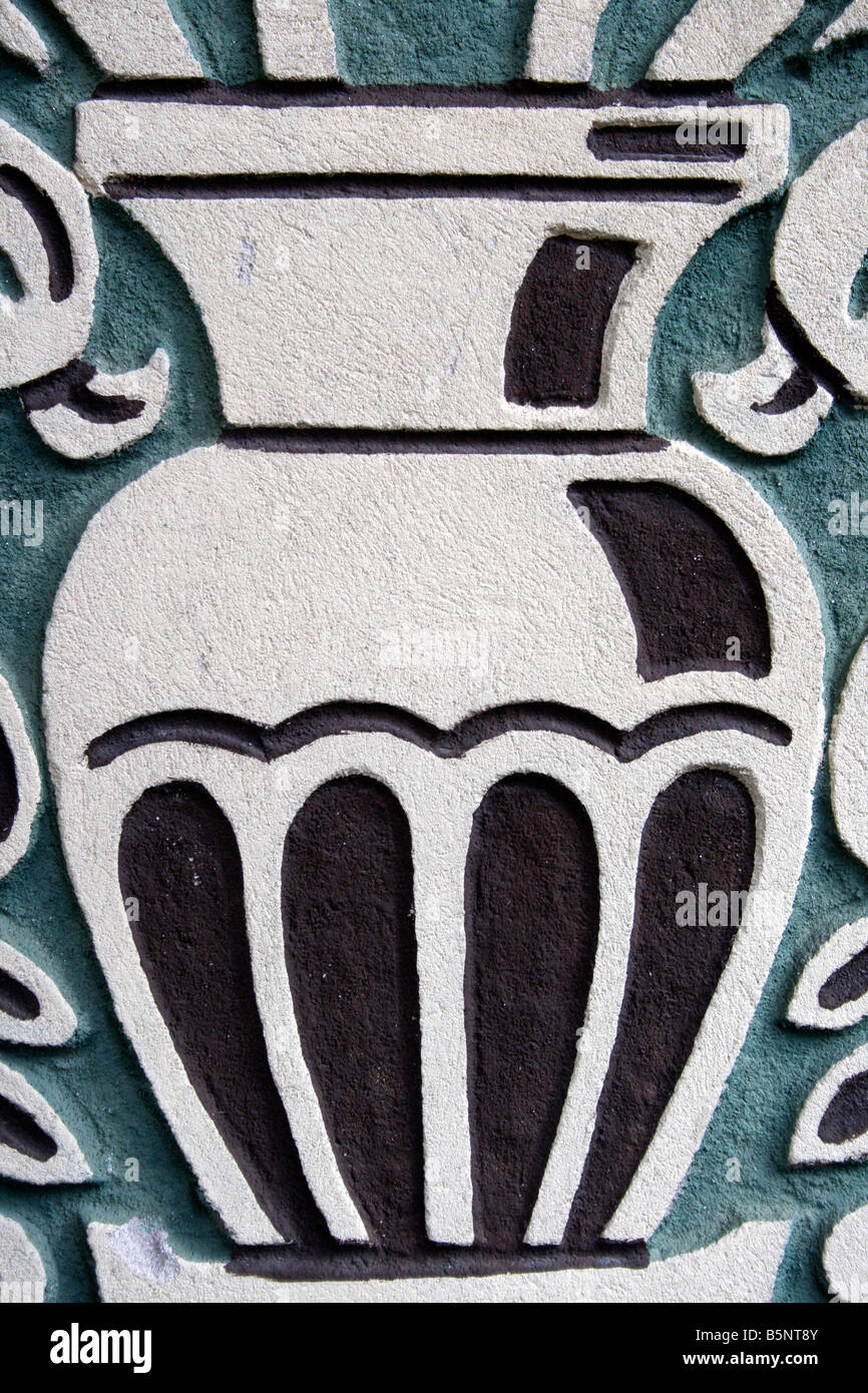 Vase or urn decoration on wall Stock Photo - Alamy