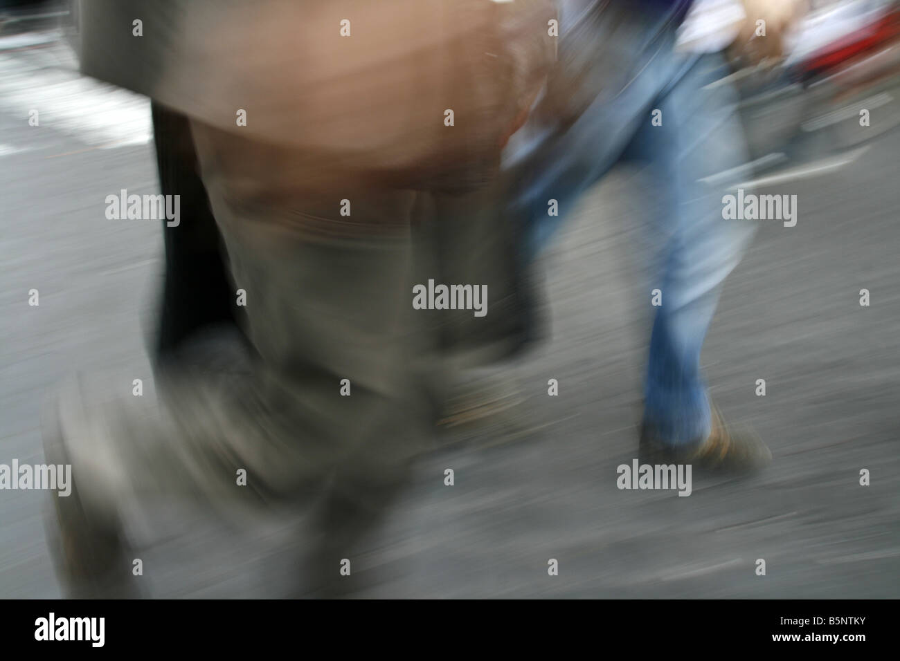 business man walking in street in city town Stock Photo - Alamy