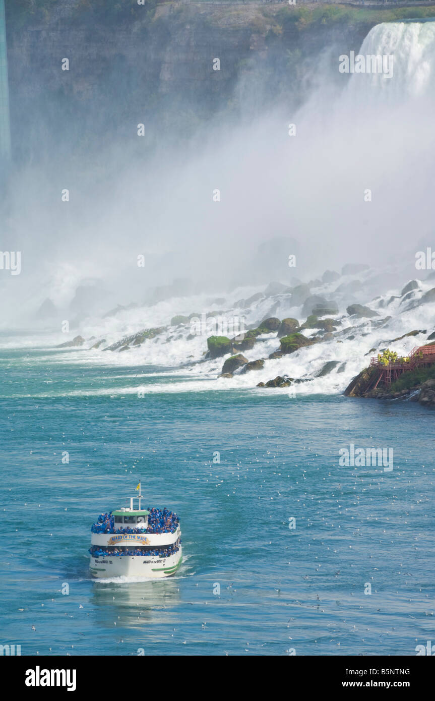 Maids of the mist boat cruise with tourists in blue raincoats American ...