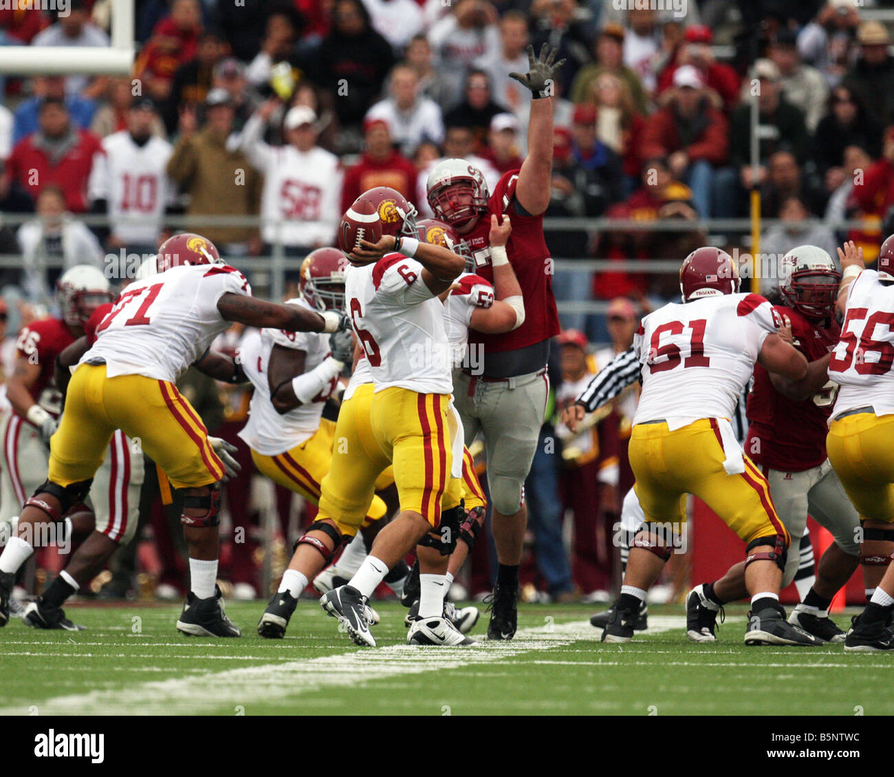 USC quarterback, Mark Sanchez, prepares to throw a pass downfield ...
