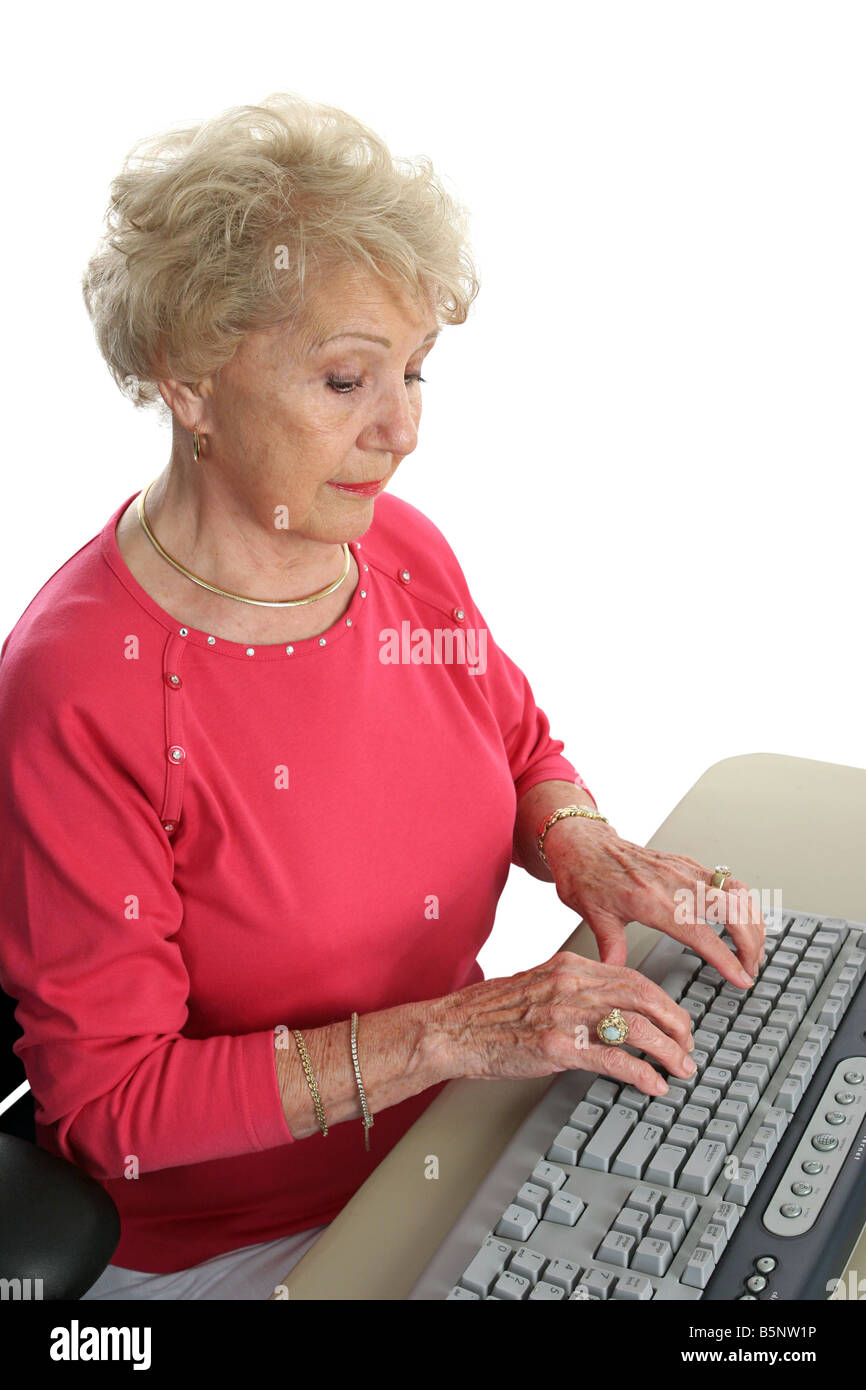 A senior lady learning how to use the computer Stock Photo - Alamy