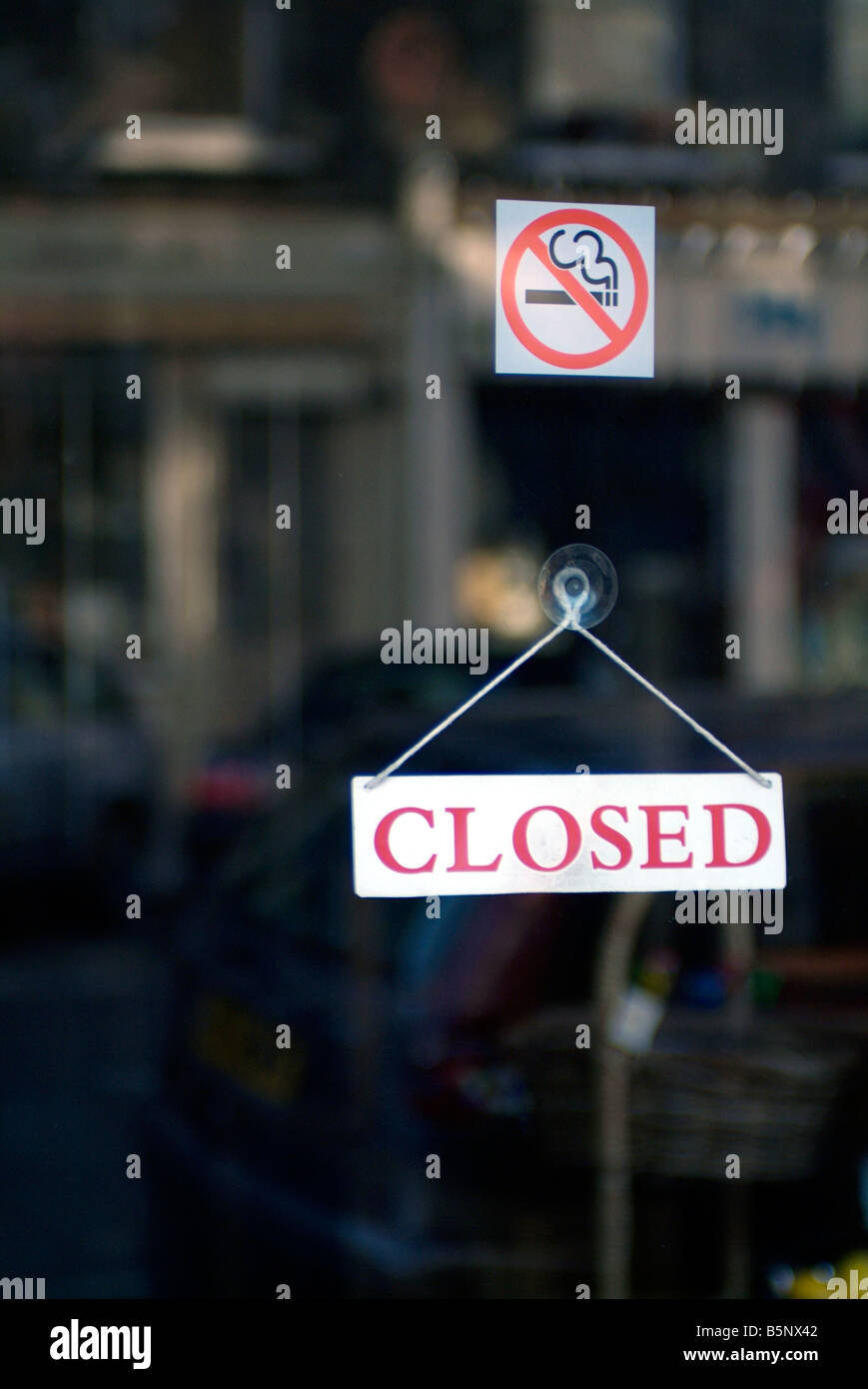 closed sign on small business window Stock Photo - Alamy