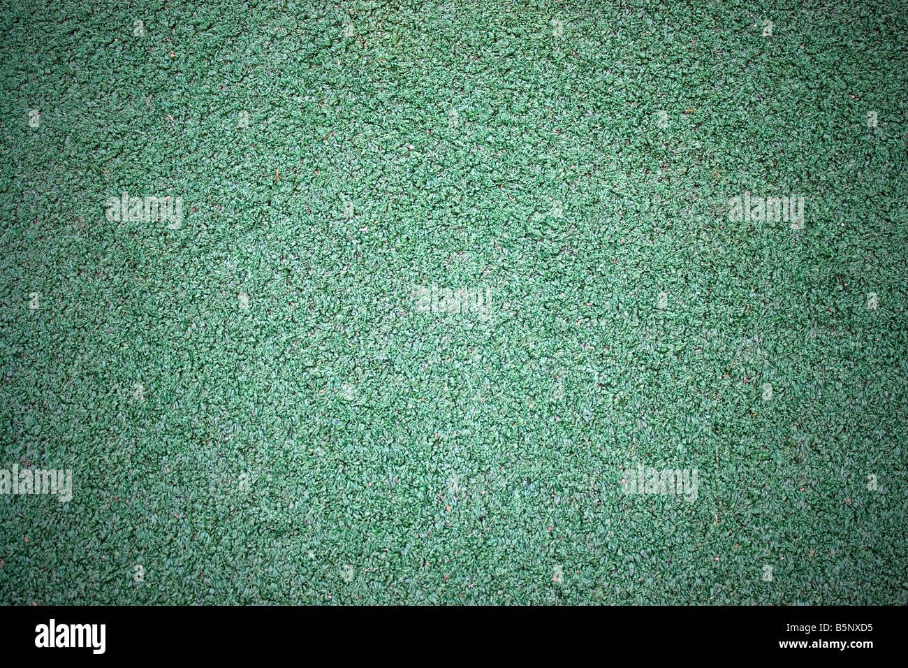 A green artificial astro turf texture commonly used in ball sports ...