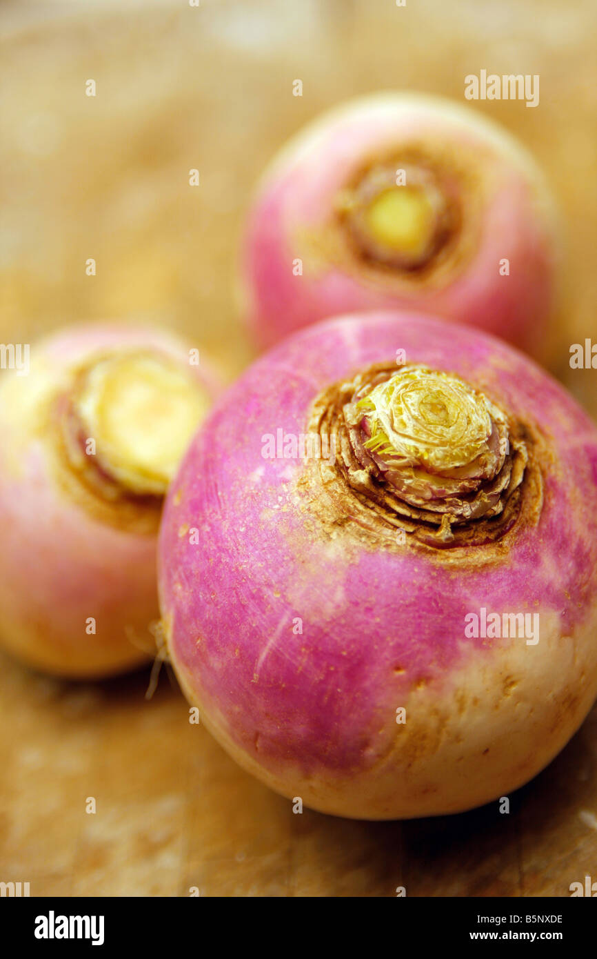 turnips on a kitchen chopping board Stock Photo - Alamy