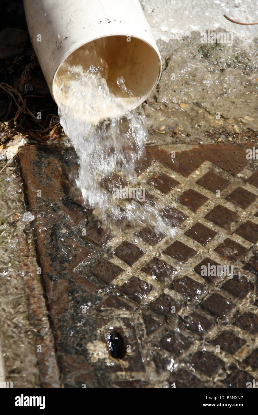 water flowing through drain pipe Stock Photo - Alamy