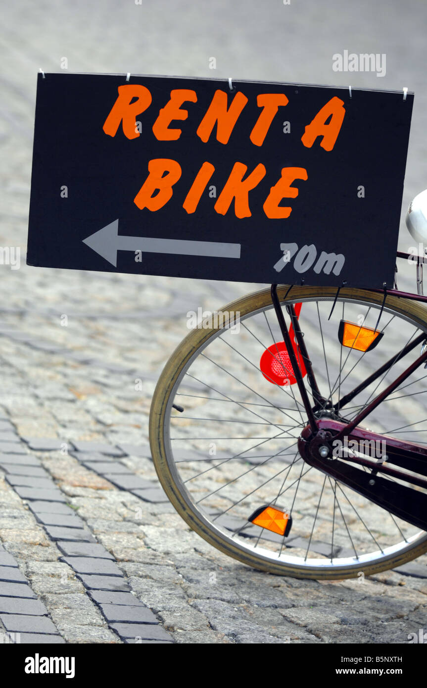 Rent a bike sign Stock Photo - Alamy