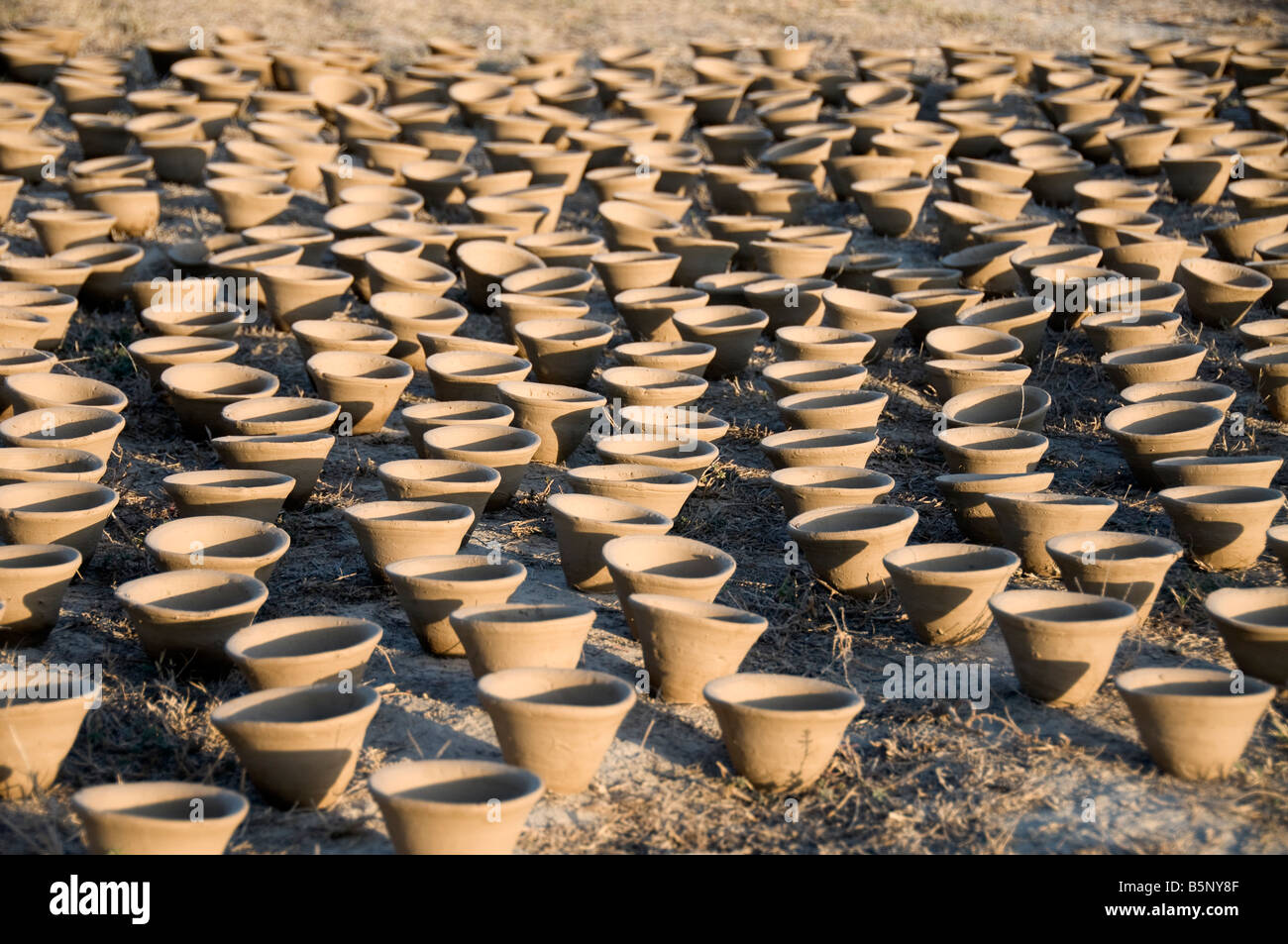 Pots Ready for firing in Kiln Lahore Pakistan Stock Photo - Alamy