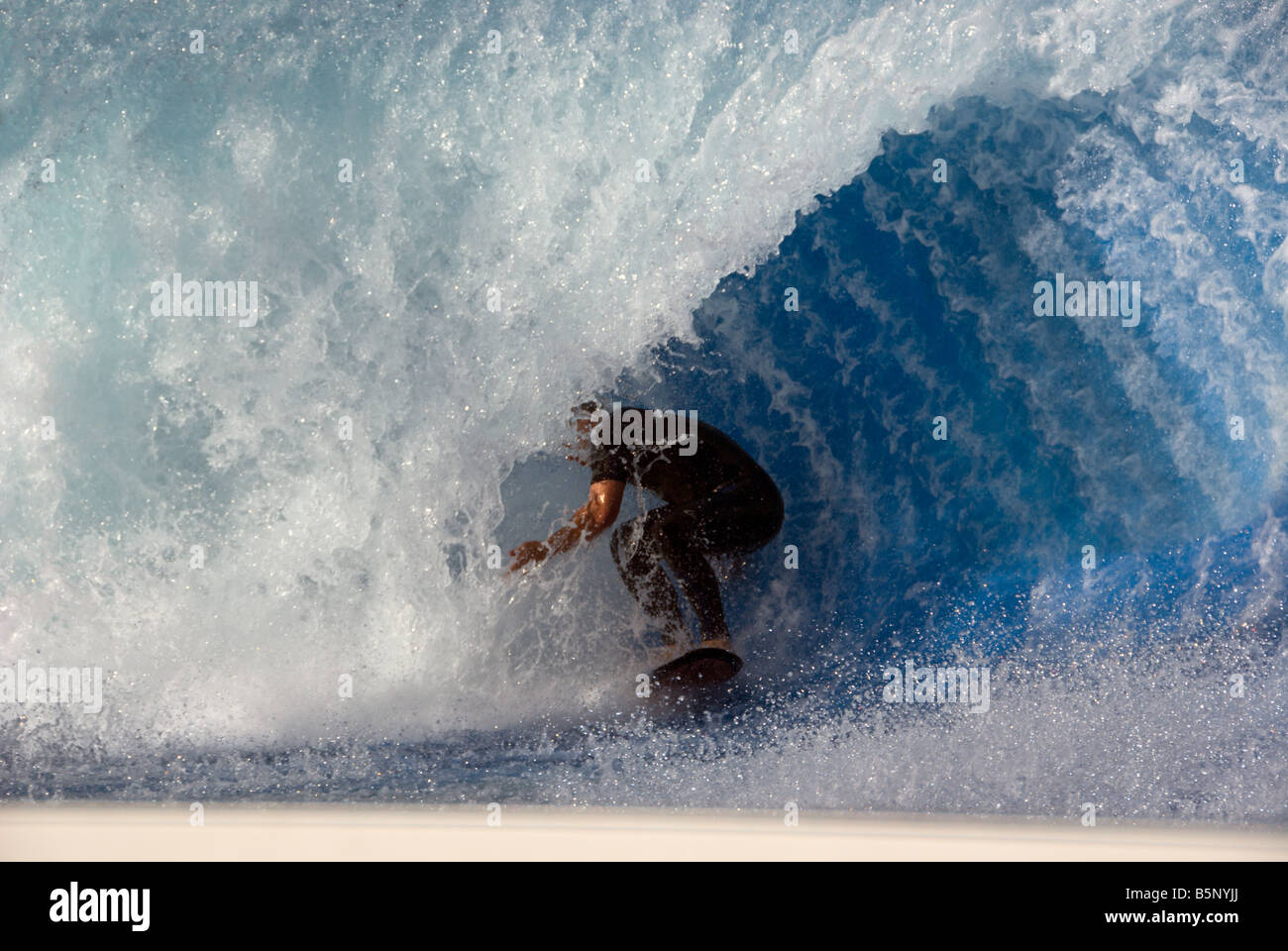 Surfer surfing on artificial wave Stock Photo - Alamy