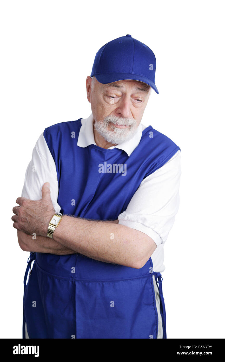 A senior man unable to retire is sad about working a menial service job ...