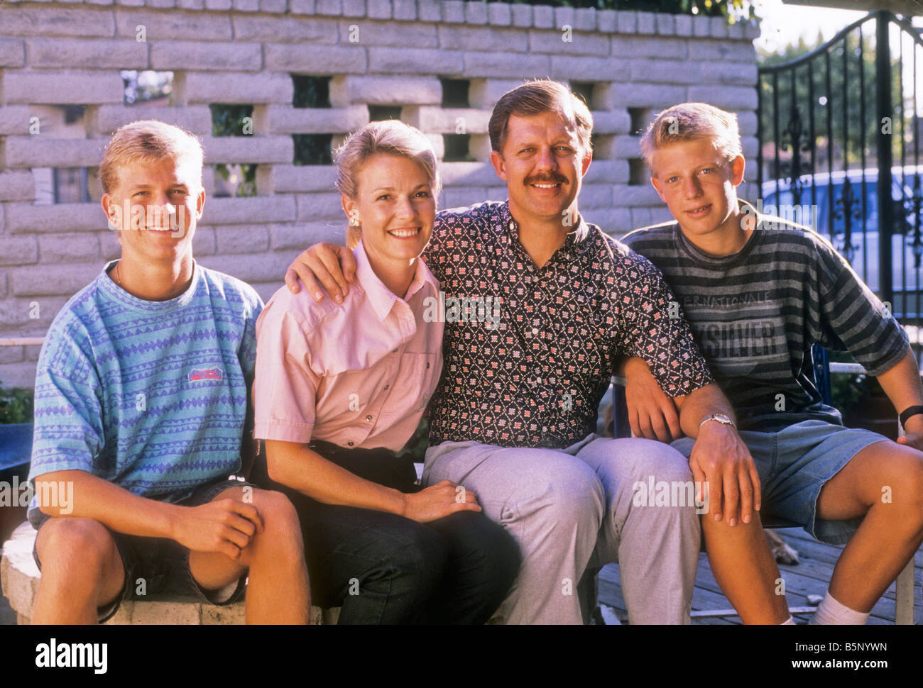 Family portrait outdoors, father, mother, two sons Stock Photo - Alamy