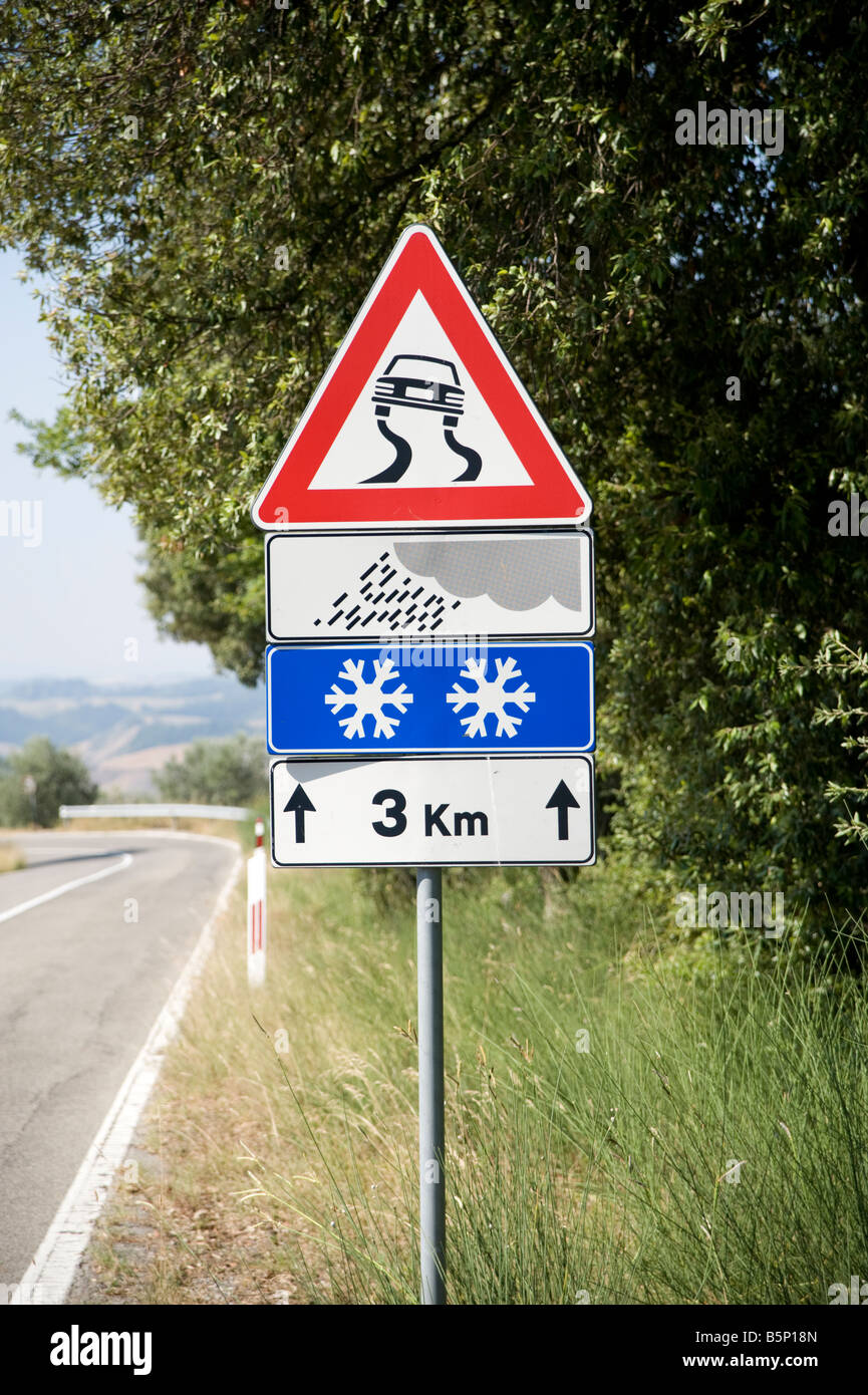 Road sign on Italian road warning of Rain,Snow and slippery conditions ...