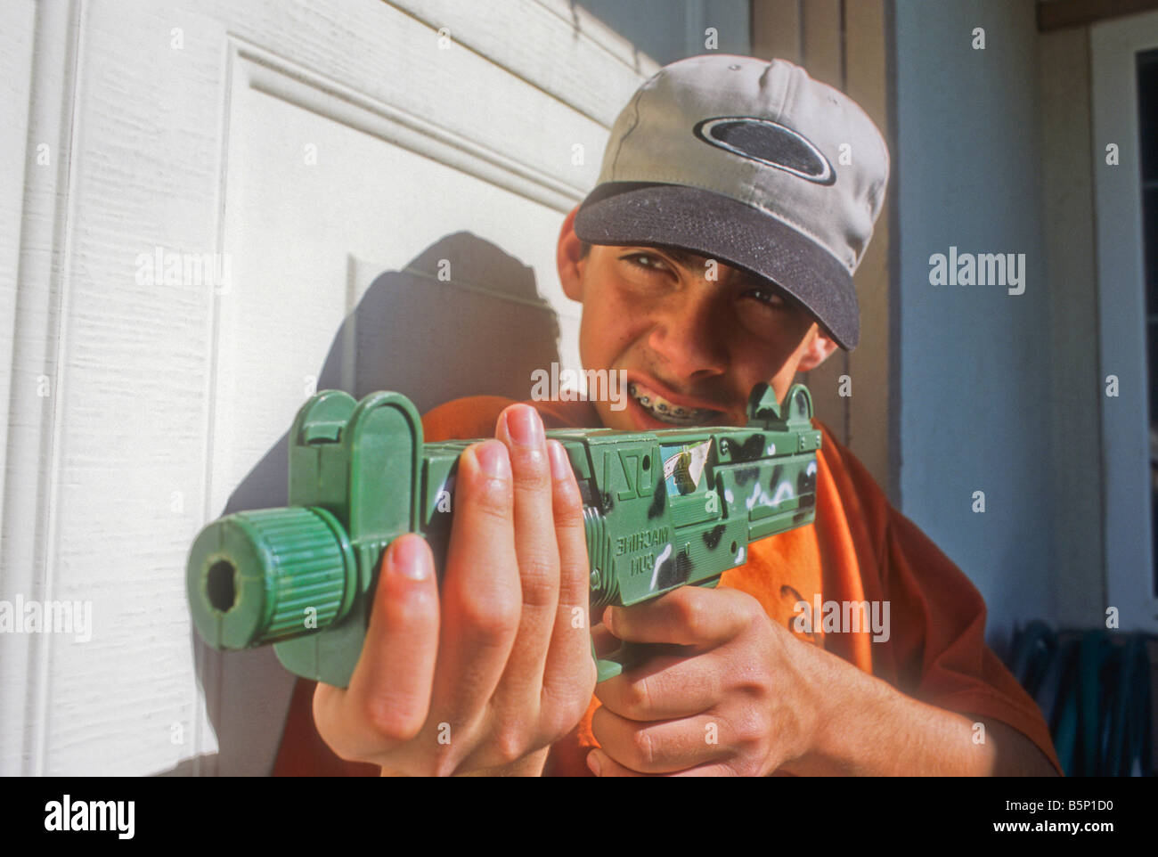boy points toy gun at friend Stock Photo - Alamy boy points toy gun at friend Stock Photo - Alamy