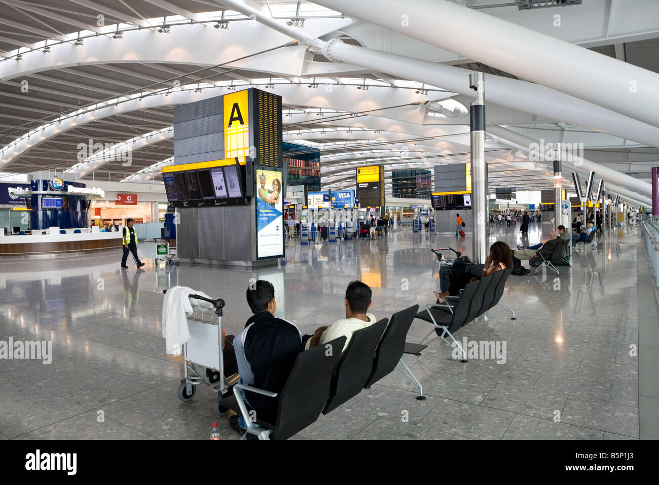 Departure level, Terminal 5, Heathrow, London, England Stock Photo - Alamy