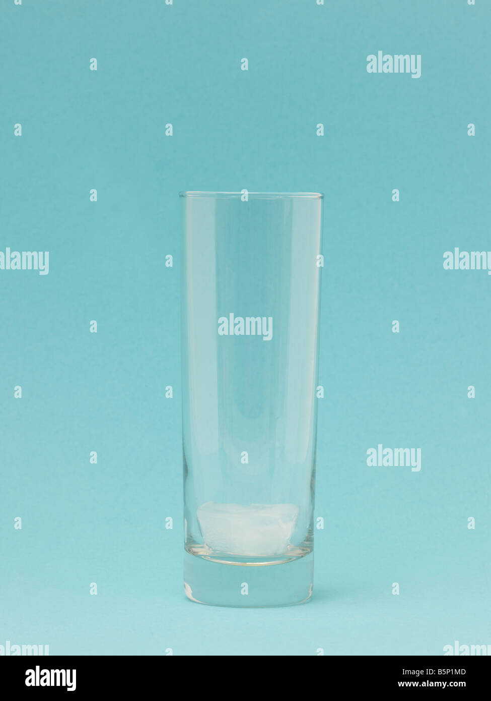 Ice Cube in a Glass Stock Photo - Alamy