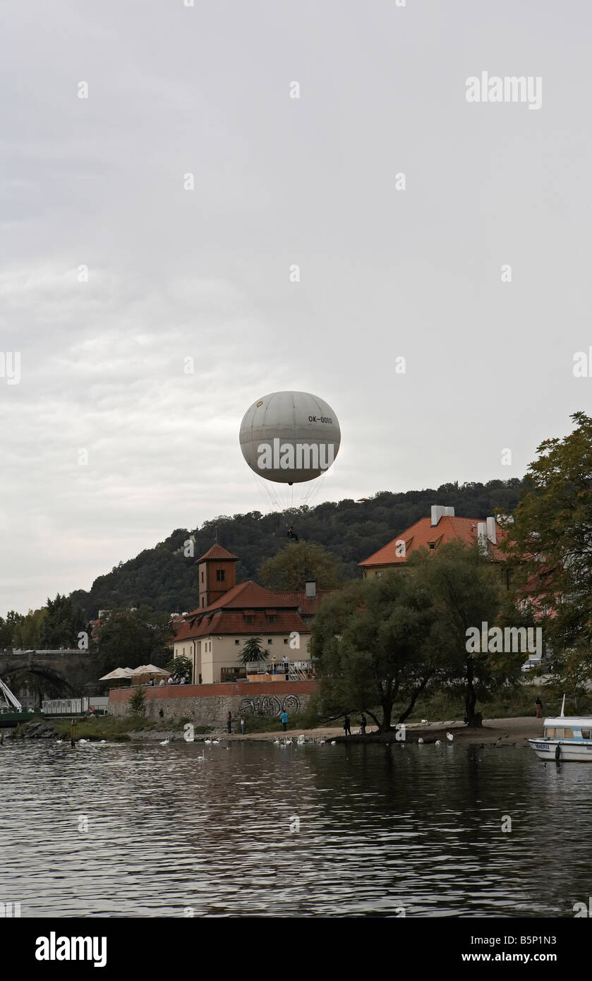 Prague viewing balloon by Charles bridge and Vltava river Stock Photo ...