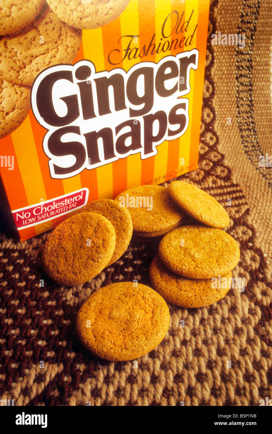 Ginger snap cookies next to box Stock Photo - Alamy