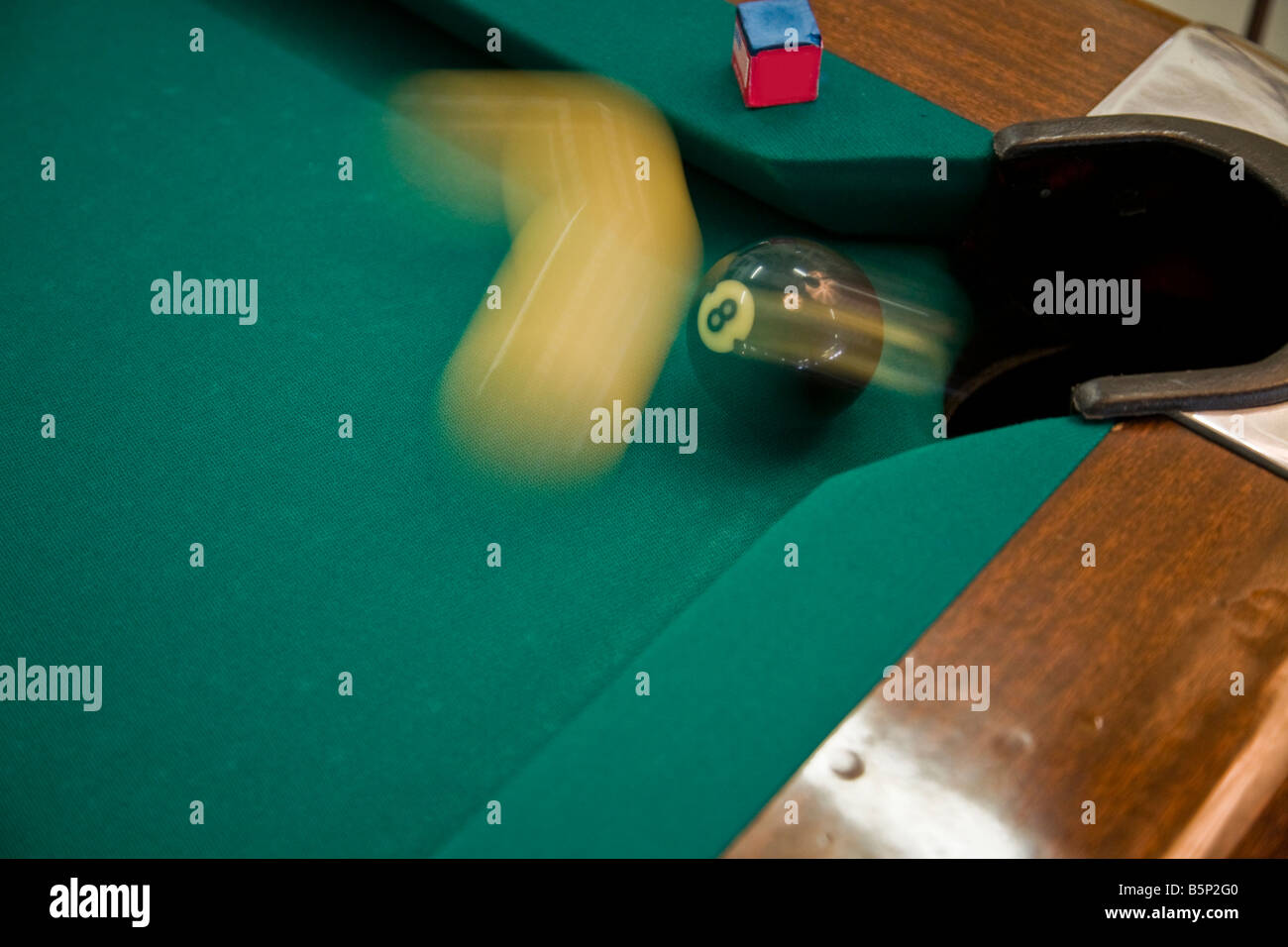 pool hall billiards cue green explode ball shoot concentrate Stock ...