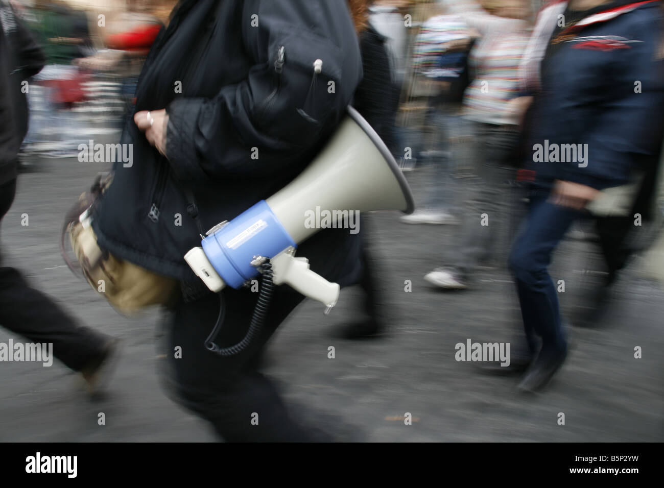 person with megaphone at political rally demo in city town Stock Photo ...