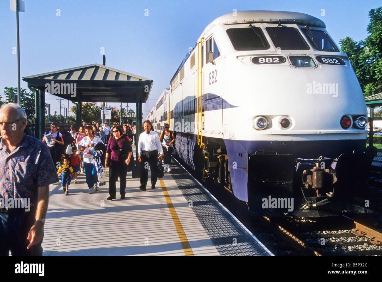 Passengers exit platform of Metrolink train in Southern California ...