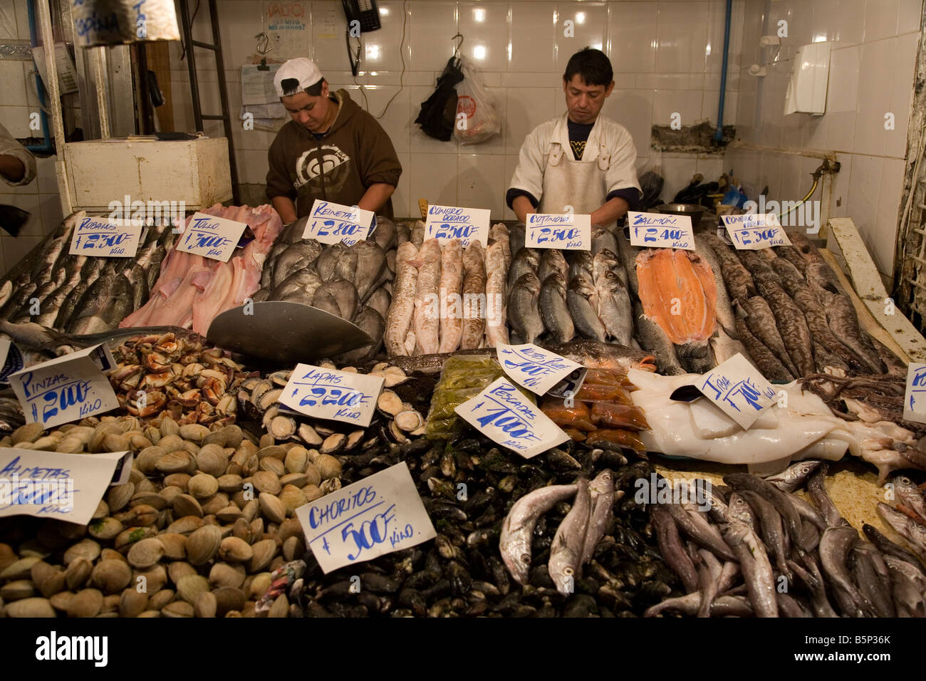 Workers selling fish at Mercado Central, Central market, Santiago ...
