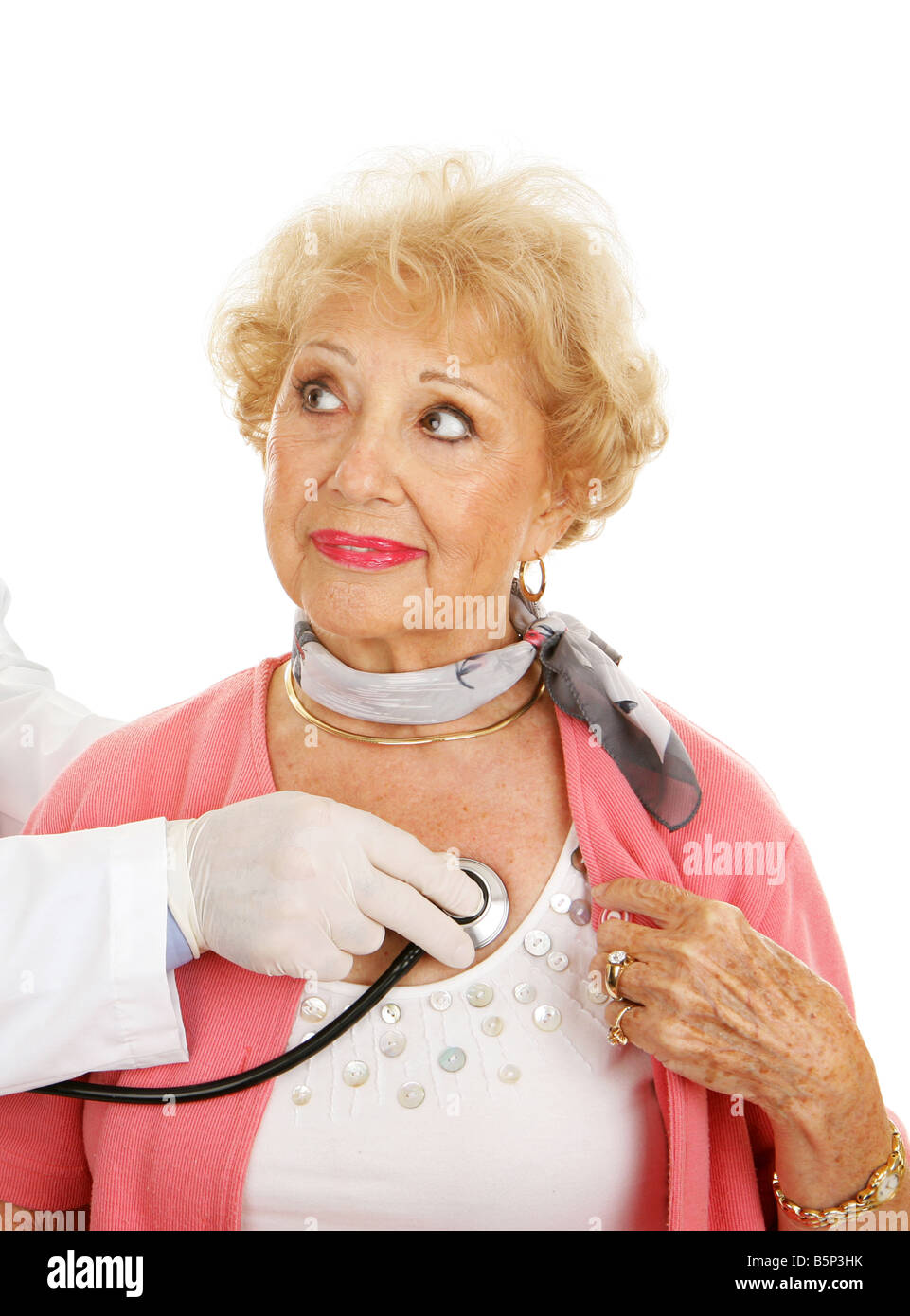 Beautiful senior lady getting a medical checkup Isolated on white ...