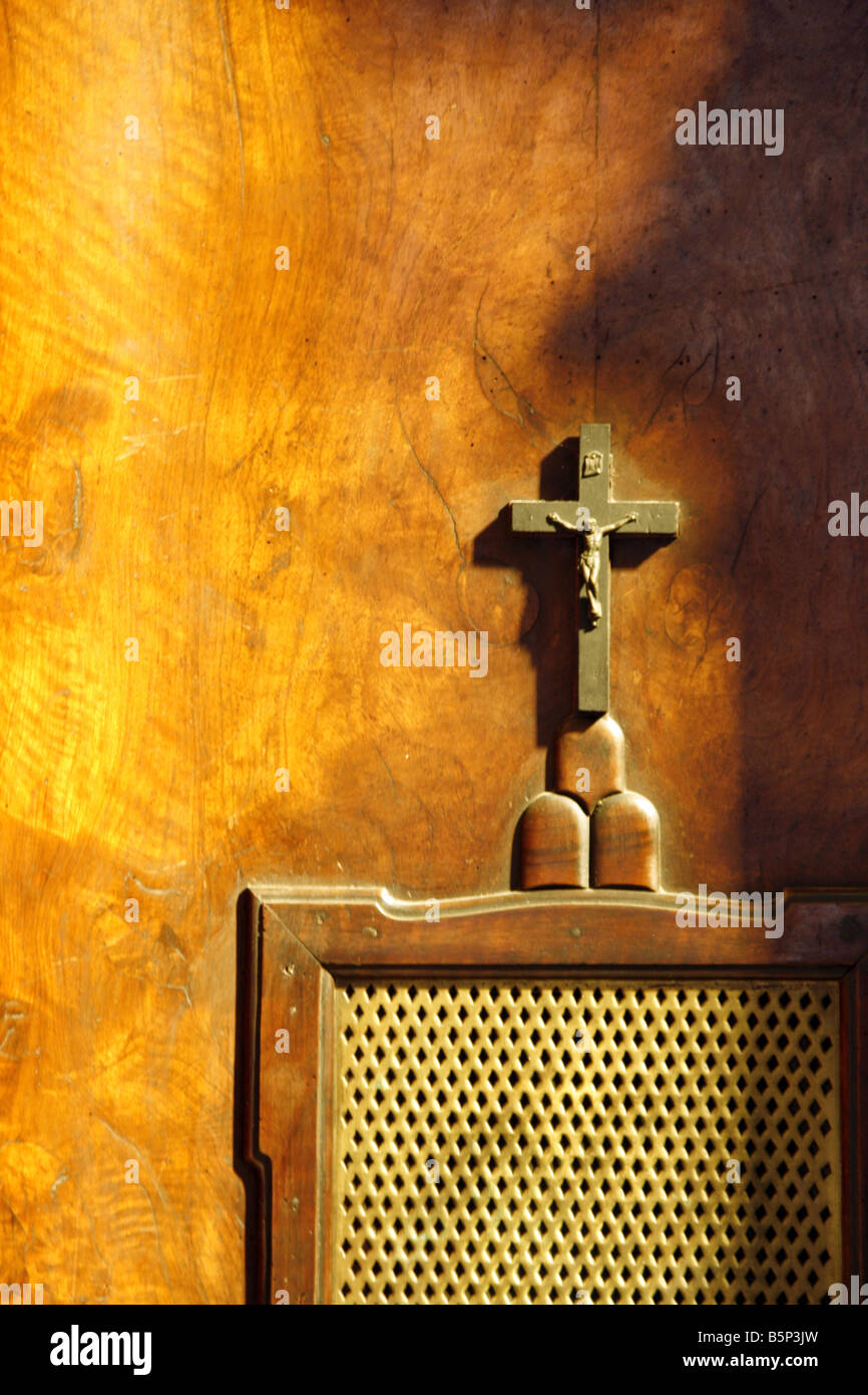 wooden cross on confession box in church in rome Stock Photo - Alamy