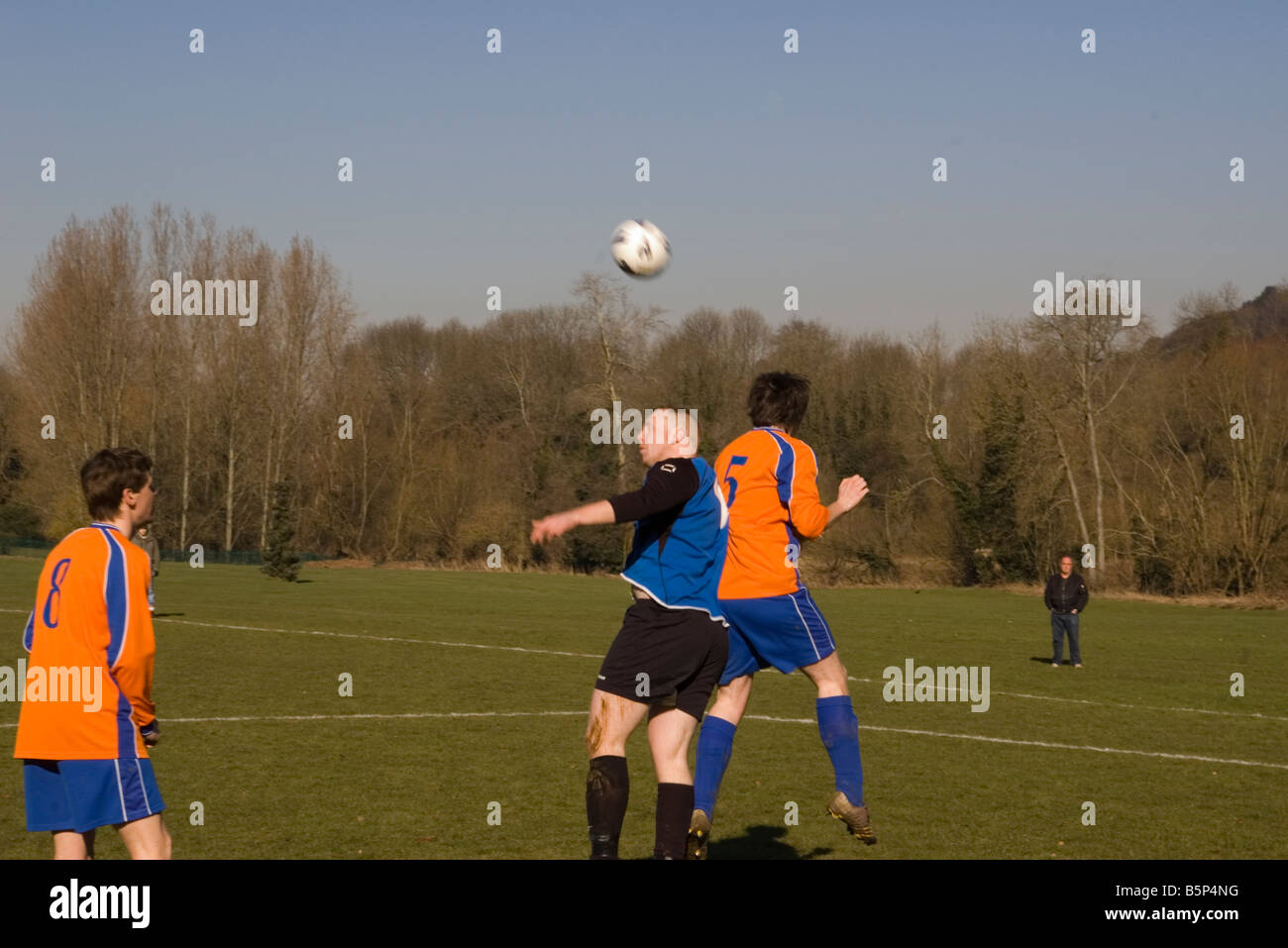 Football Players Heading The Football Soccer Players Jumping For The ...