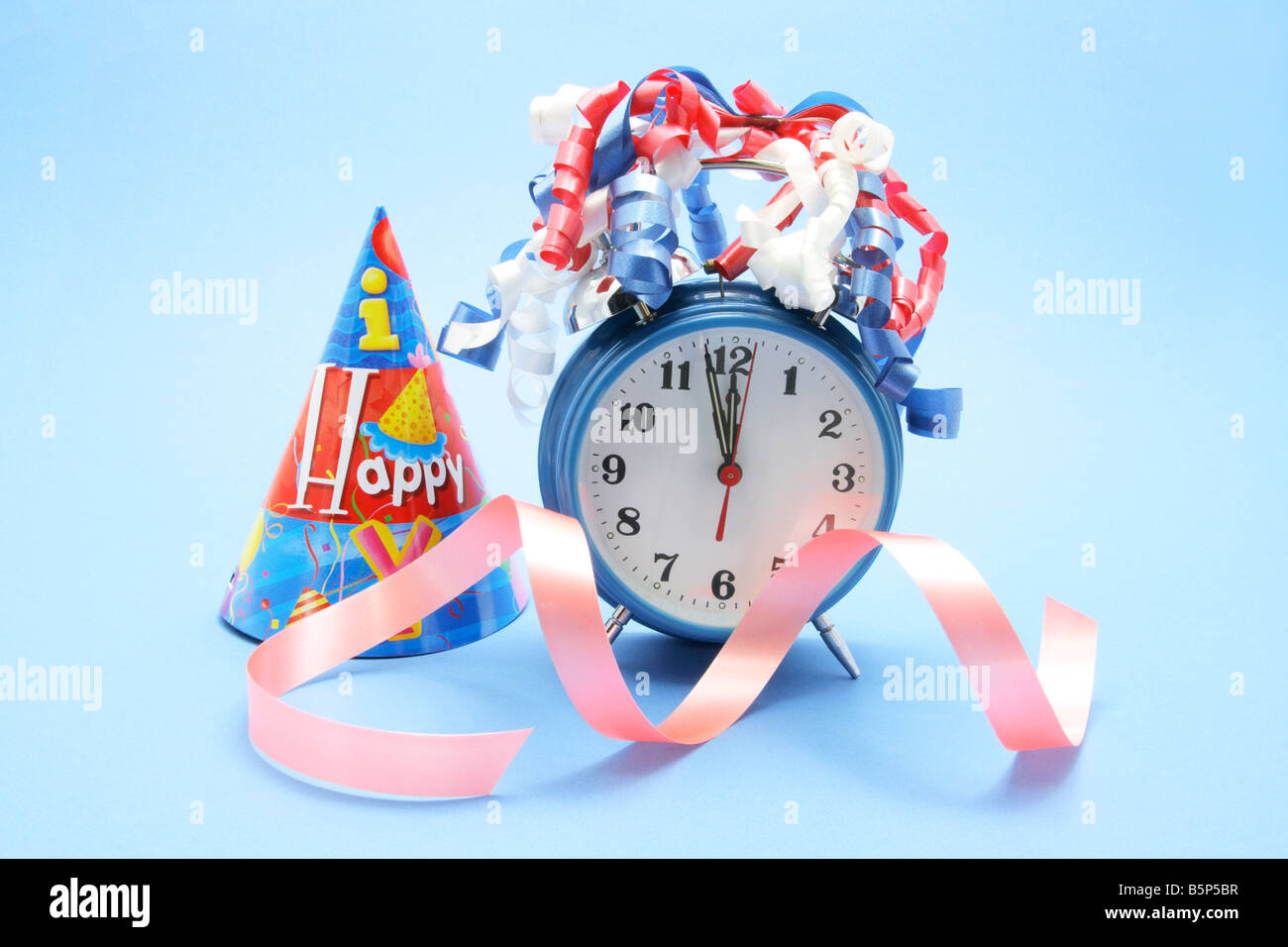 Party Favors and Alarm Clock Stock Photo - Alamy