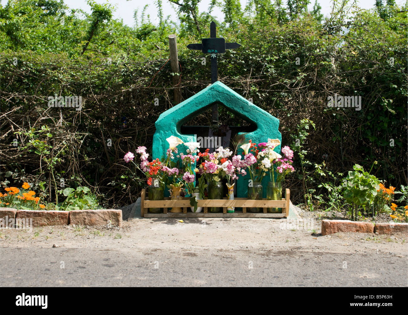 roadside shrine, Rengo Stock Photo - Alamy