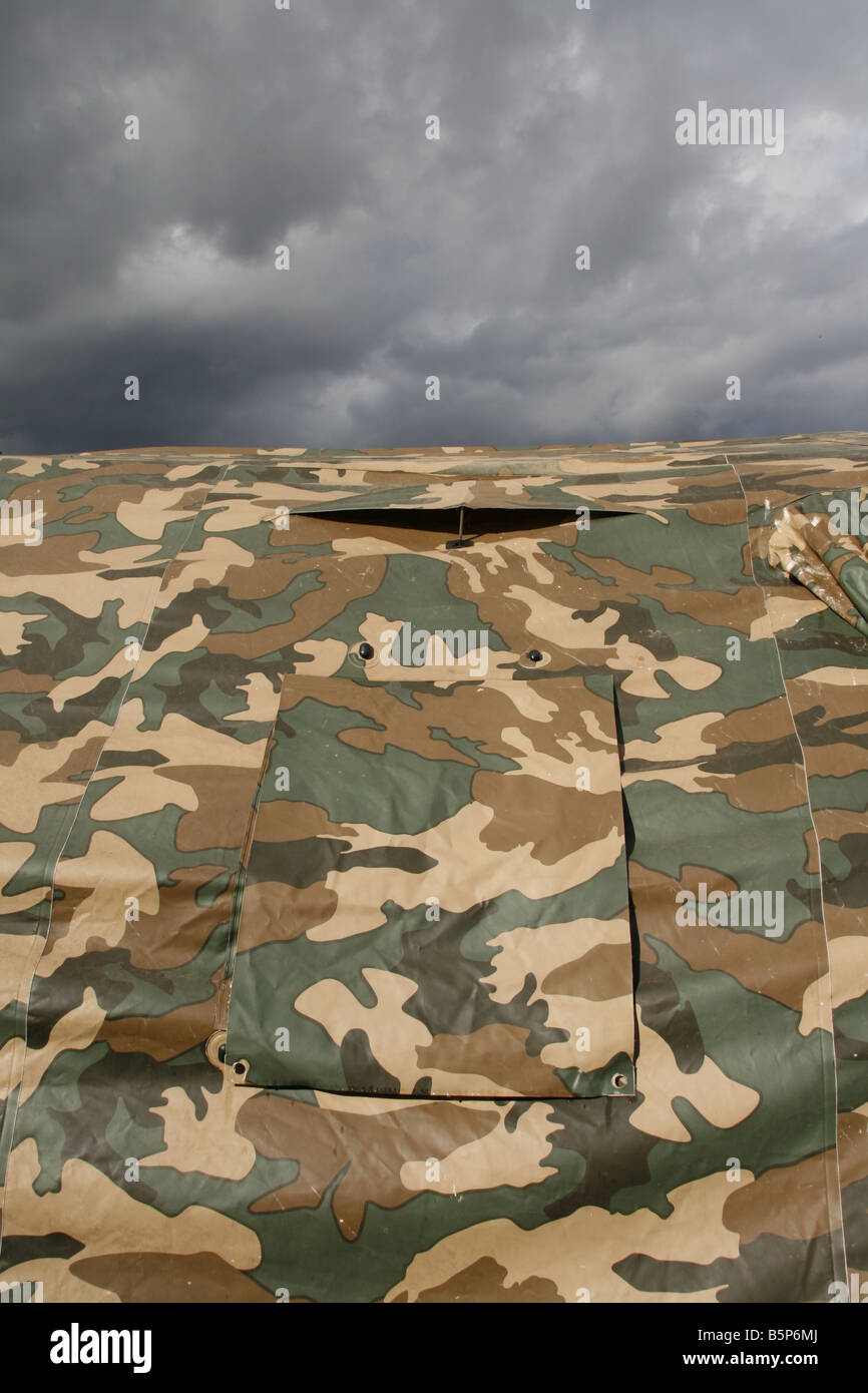 camouflage military army base tent at open day Stock Photo - Alamy