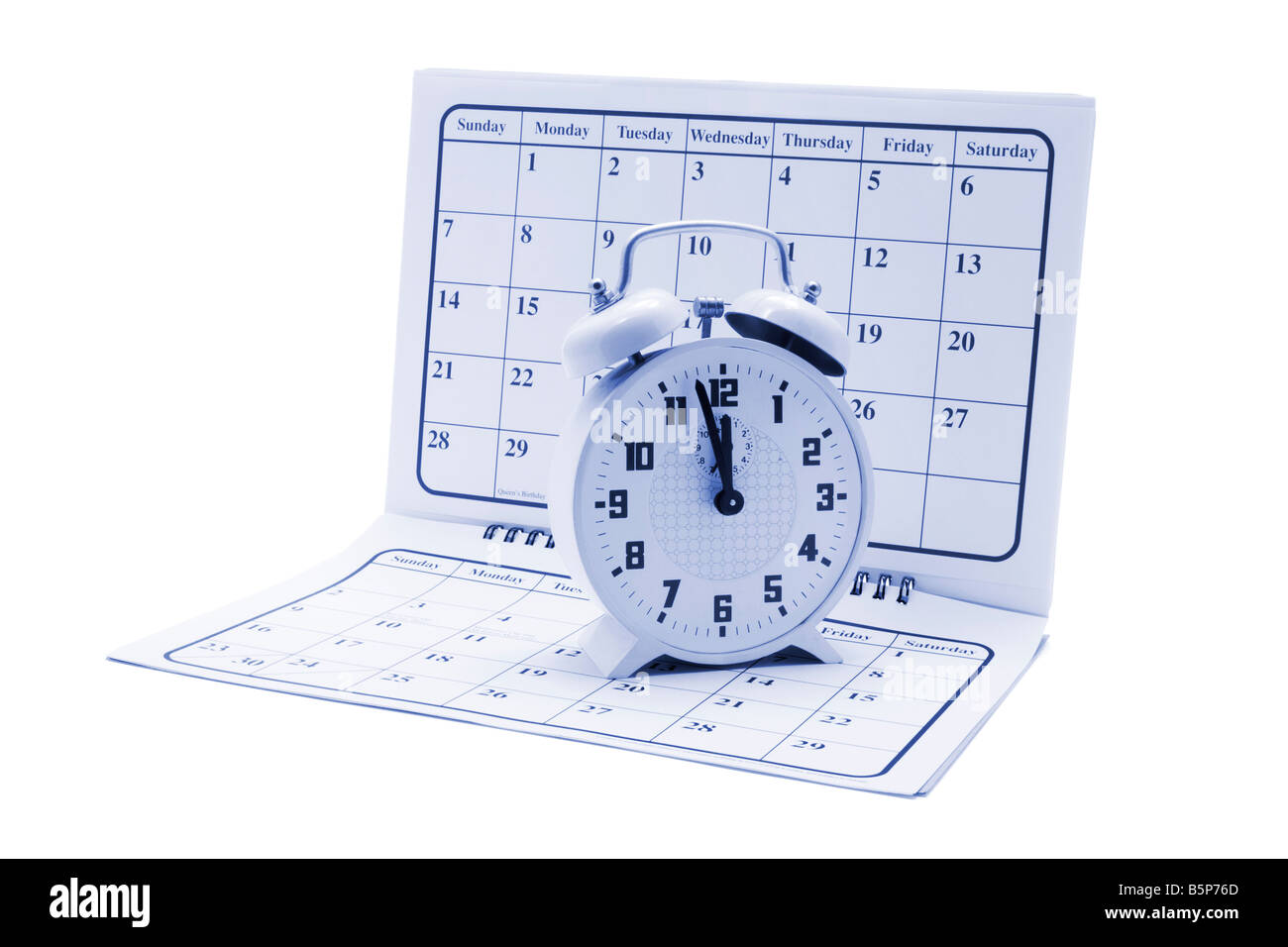 Alarm Clock on Calendar Stock Photo - Alamy