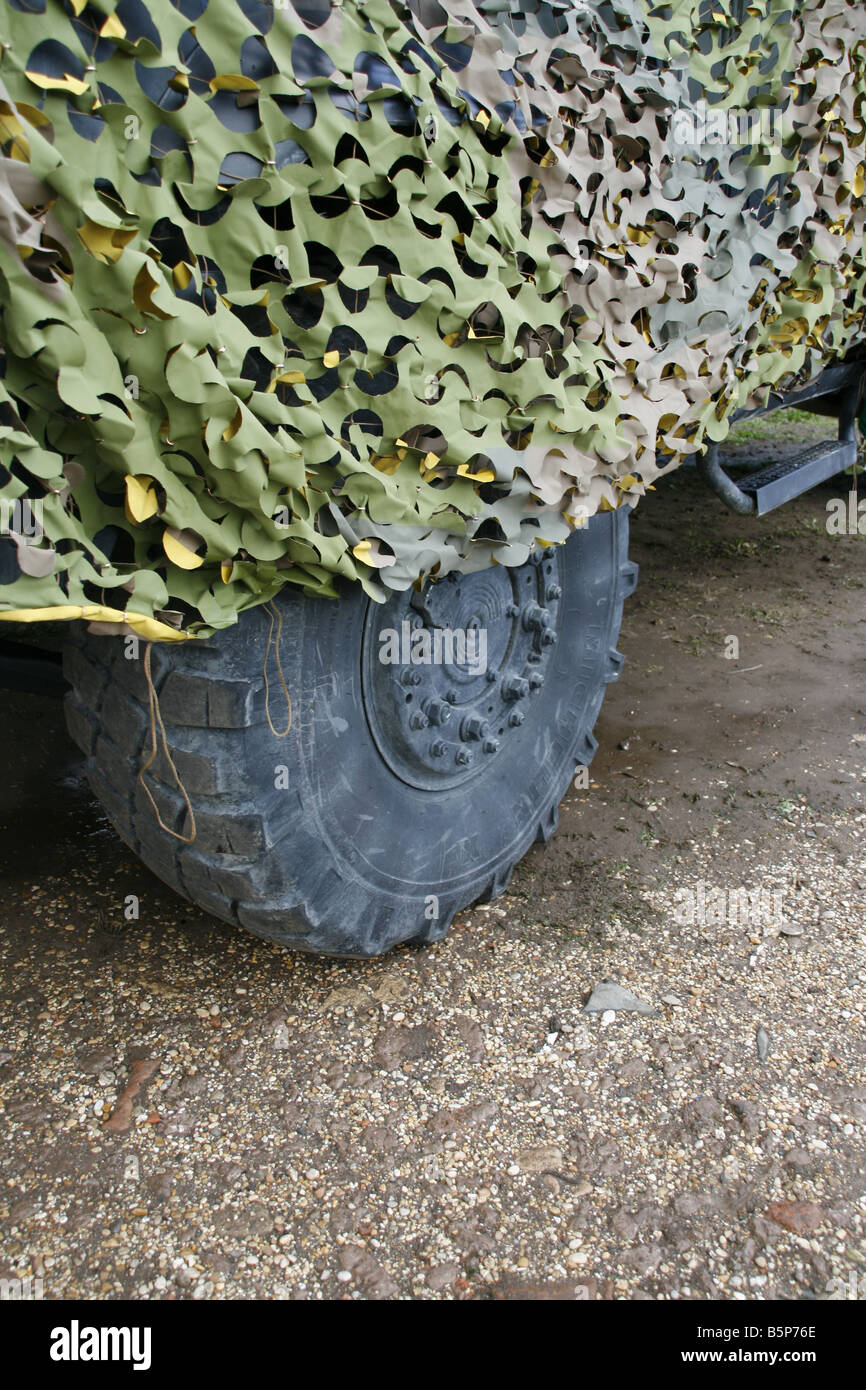 vehicle by camouflage military army base tent at open day Stock Photo ...