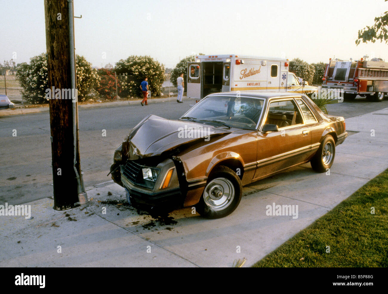 Car crashes into telephone pole Stock Photo - Alamy