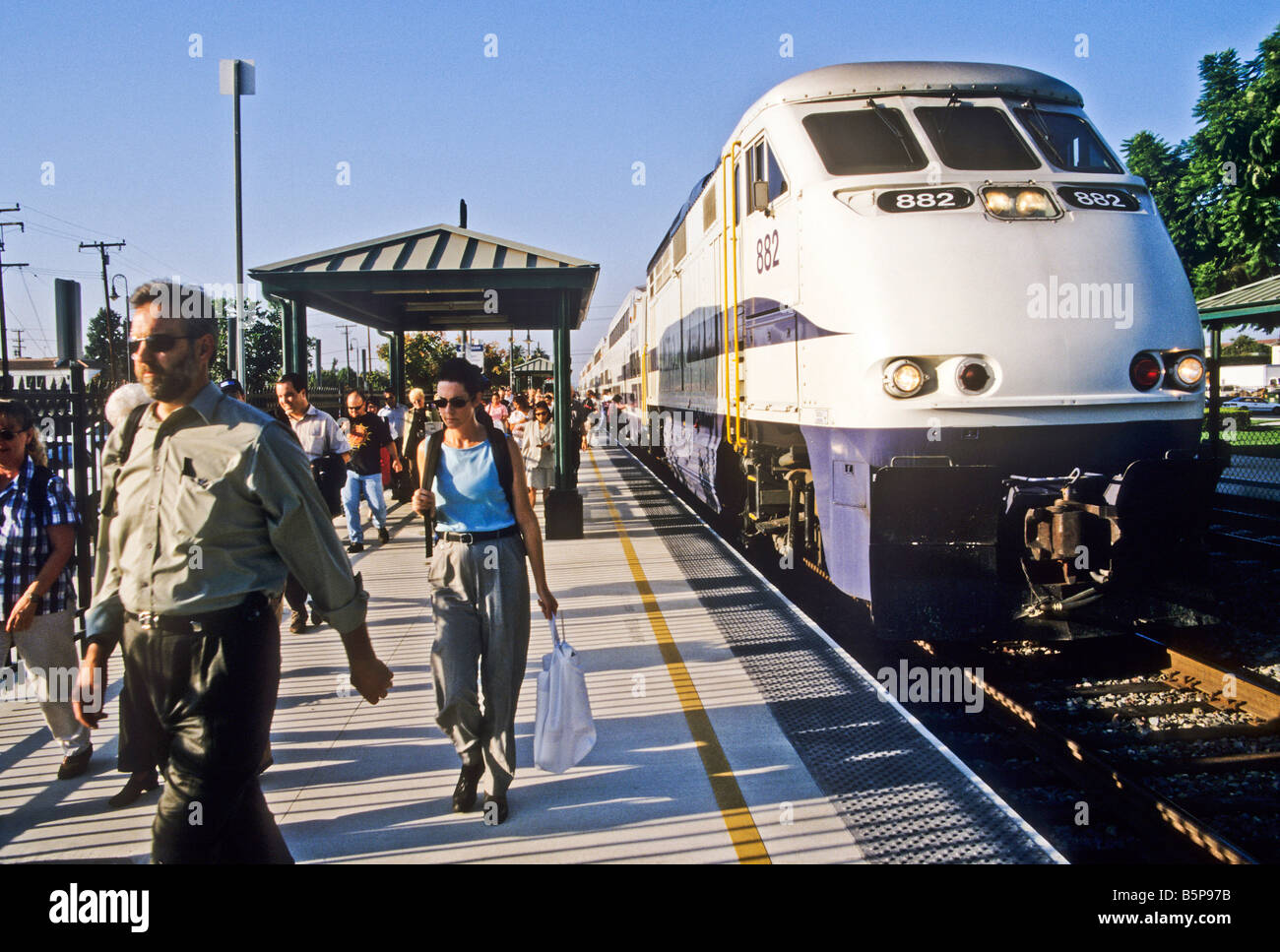 Passengers exit platform of Metrolink train in Southern California ...