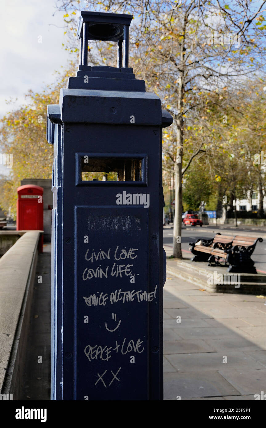 Graffiti on an old police telephone box, Victoria Embankment, London ...
