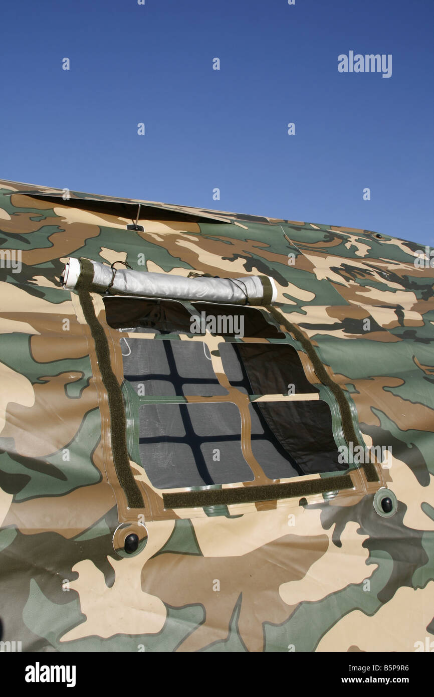 camouflage military army base tent at open day Stock Photo - Alamy