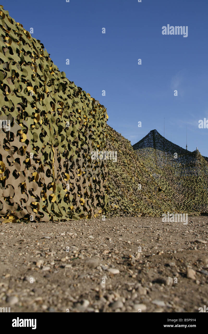 camouflage military army base tent at open day Stock Photo - Alamy
