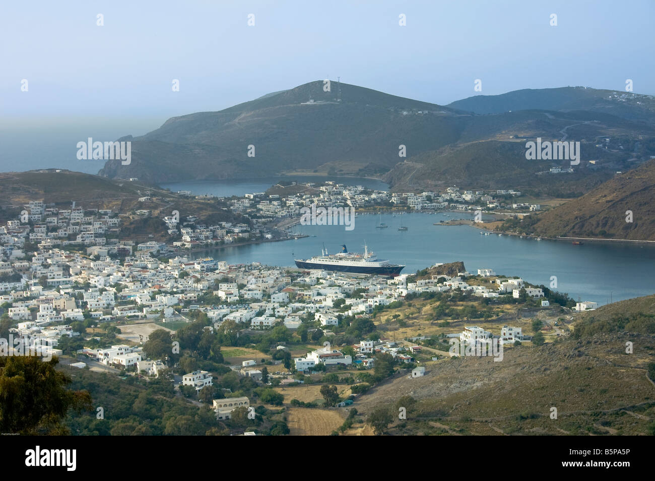 cityscape and harbor of Skala of Patmos island, Greece Stock Photo - Alamy