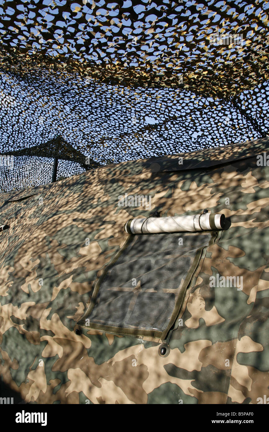 camouflage military army base tent at open day Stock Photo - Alamy