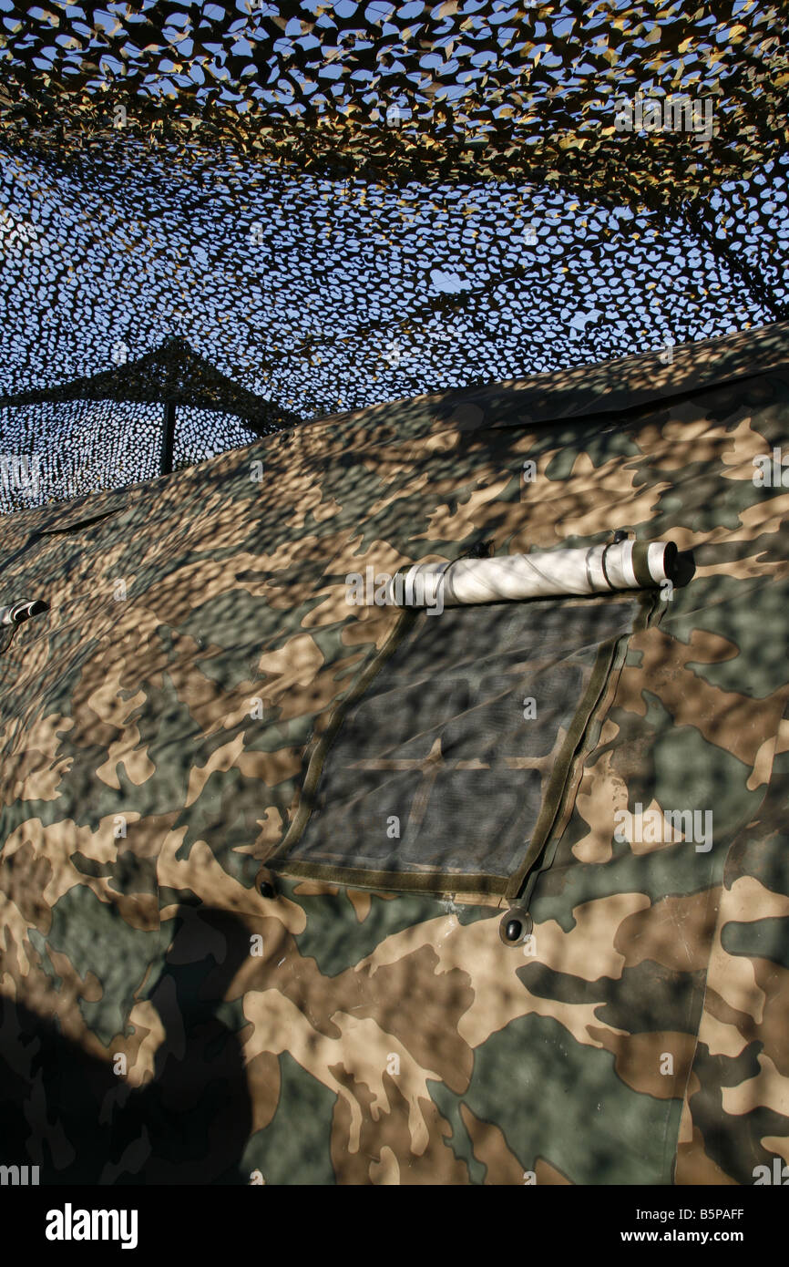 camouflage military army base tent at open day Stock Photo - Alamy