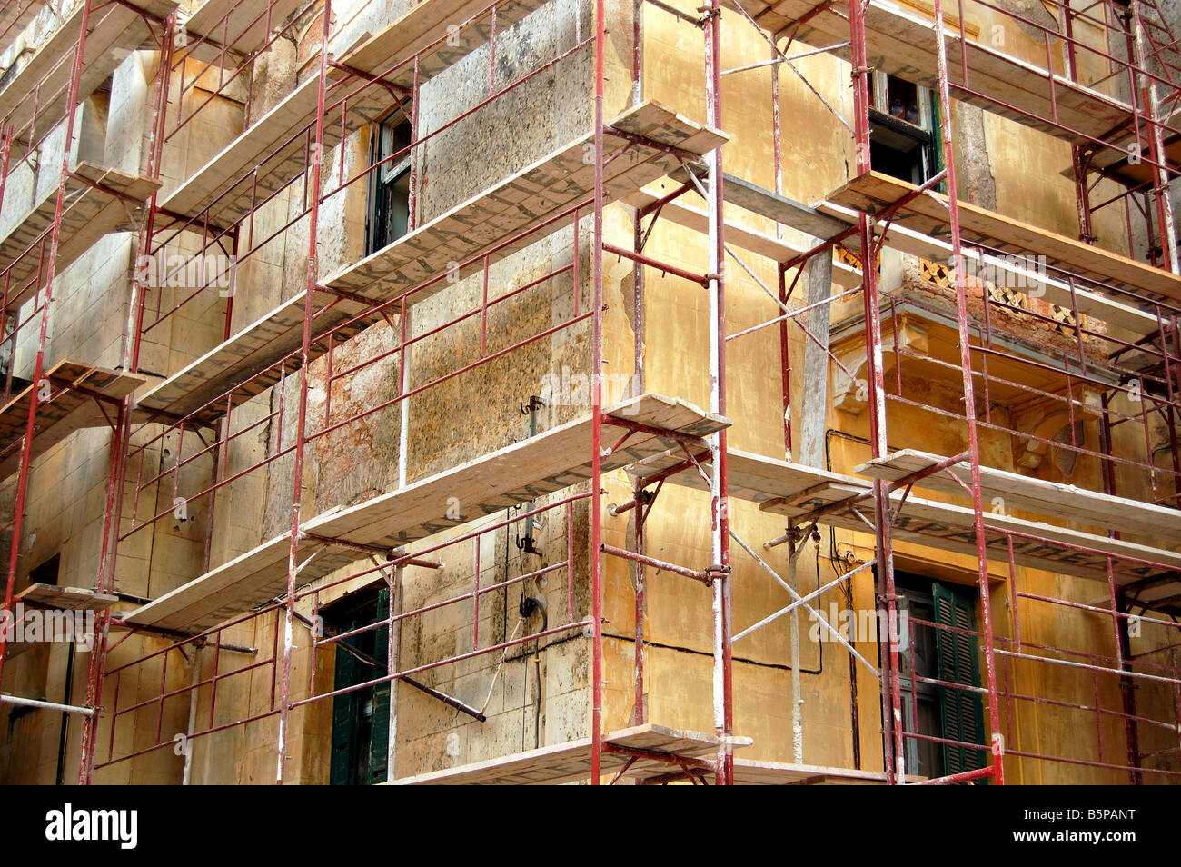 Abandoned 19th century mansion renovation. Scaffolding framework ...