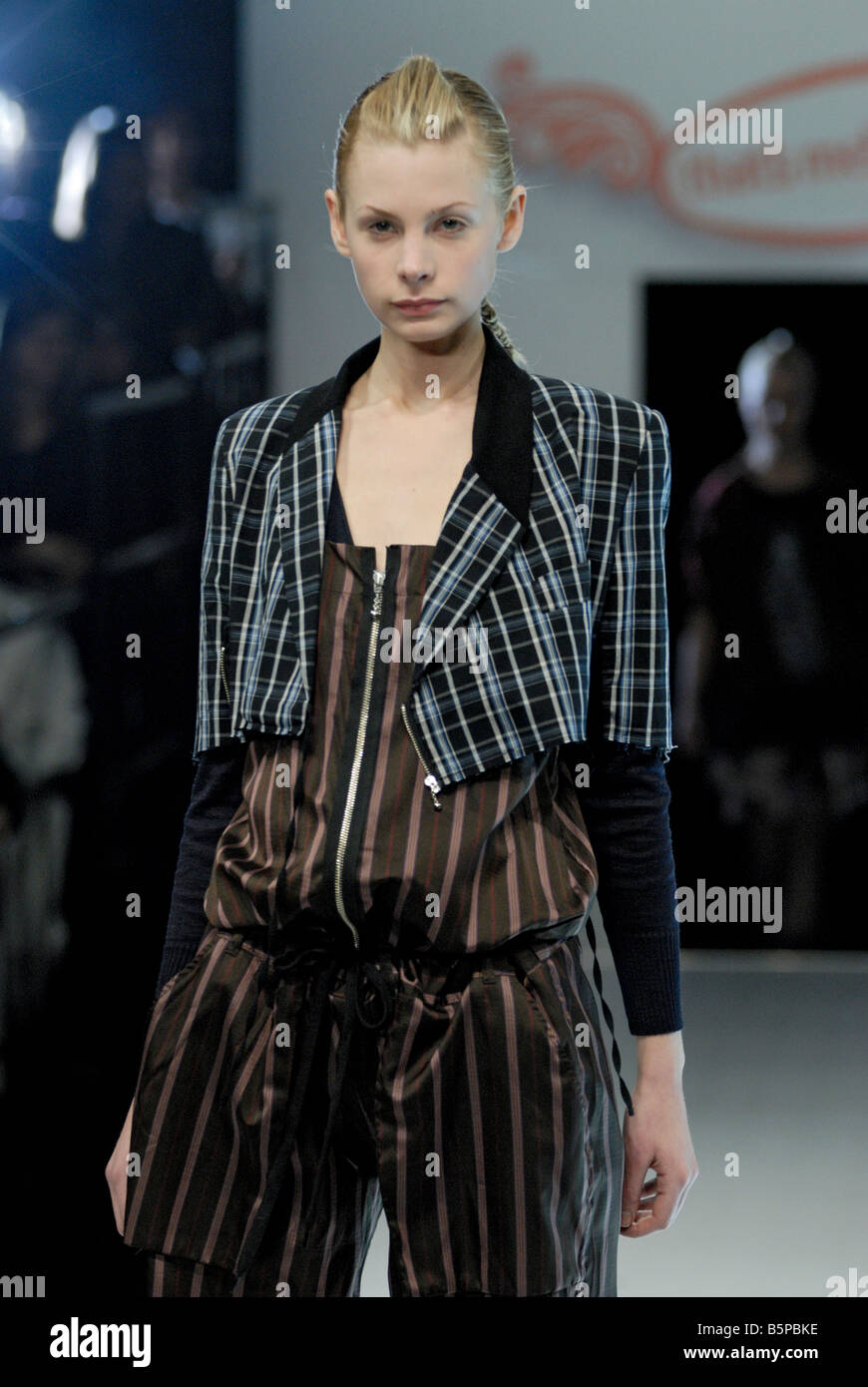 Female model at fashion show Stock Photo - Alamy