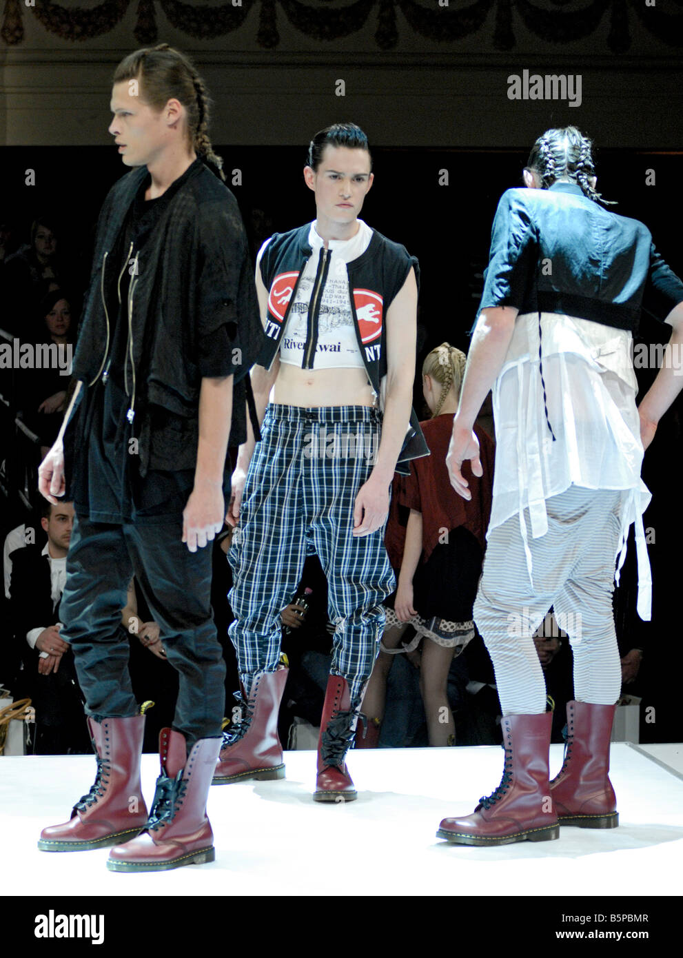 Male models at fashion show Stock Photo - Alamy