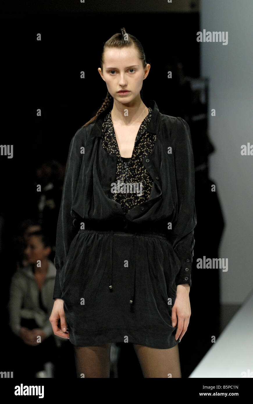 Female model at fashion show Stock Photo - Alamy