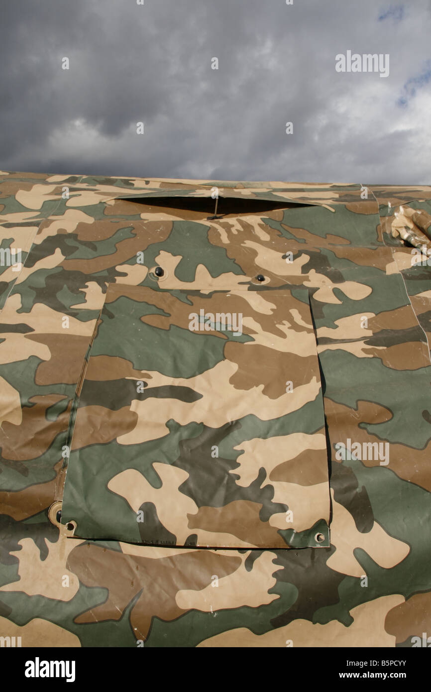 camouflage military army base tent at open day Stock Photo - Alamy