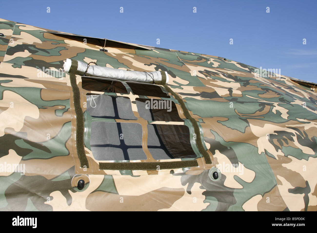 camouflage military army base tent at open day Stock Photo - Alamy