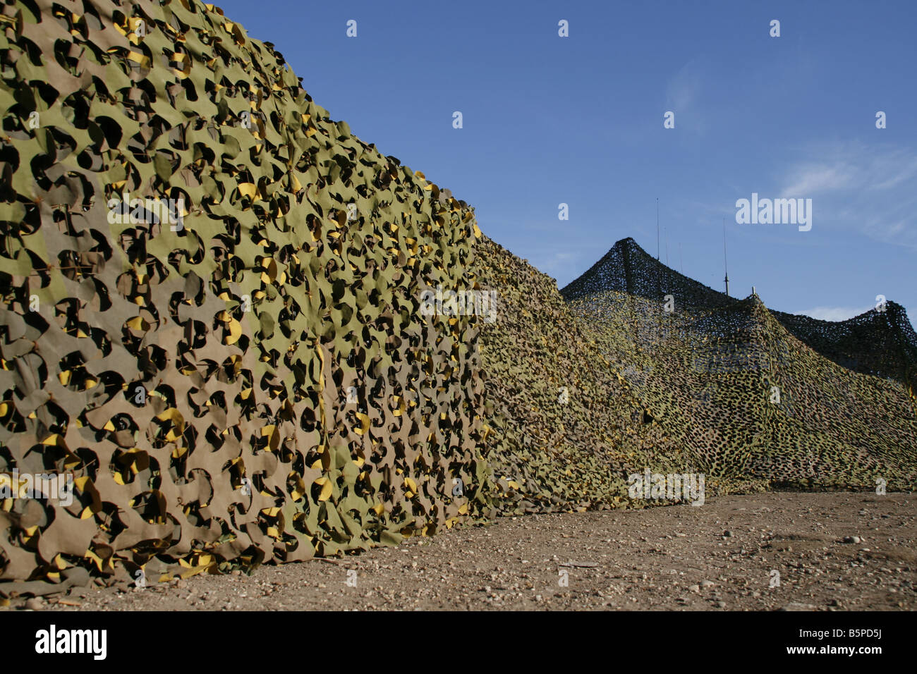 camouflage military army base tent at open day Stock Photo - Alamy
